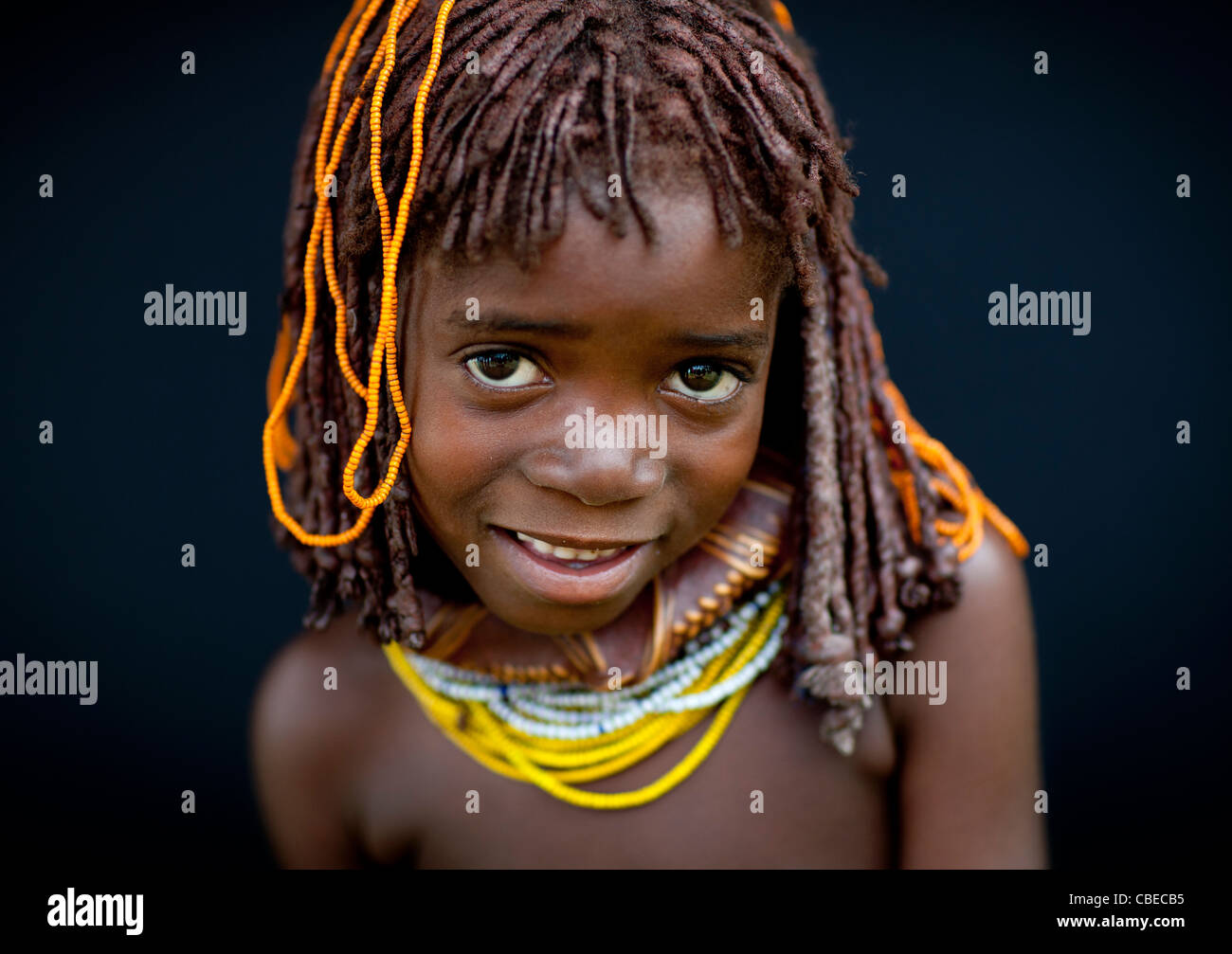 Mwila Girl With The Traditional Vikeka Mud Necklace, Angola Stock Photo ...