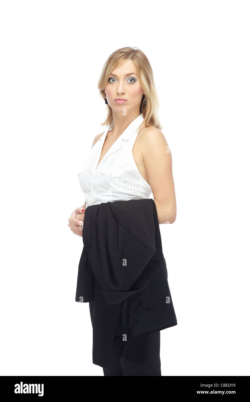 Blond woman in formal wear stands on a white background Stock Photo - Alamy