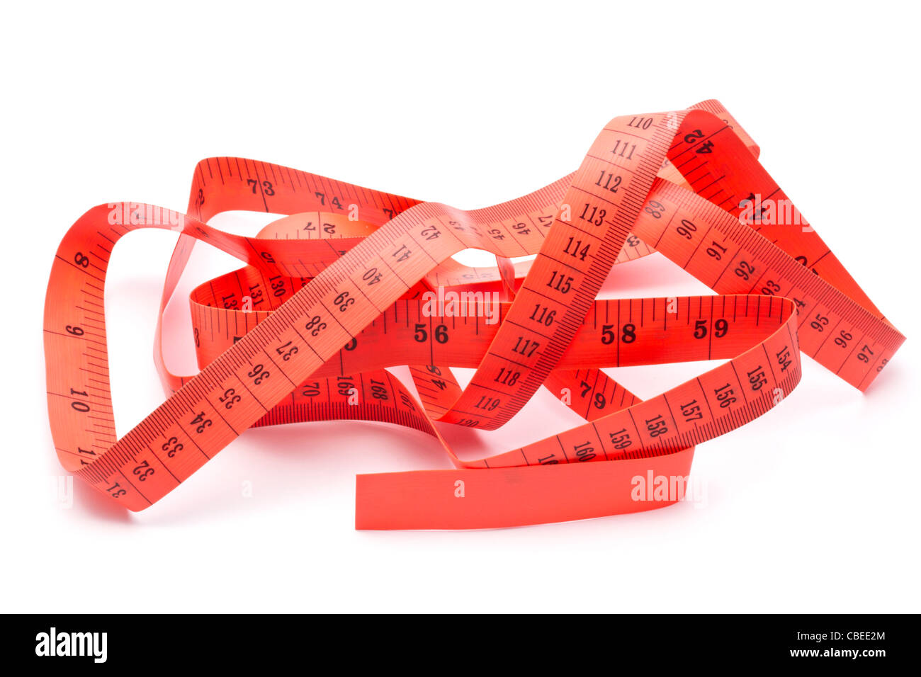 Red tape measure closeup on white background Stock Photo - Alamy
