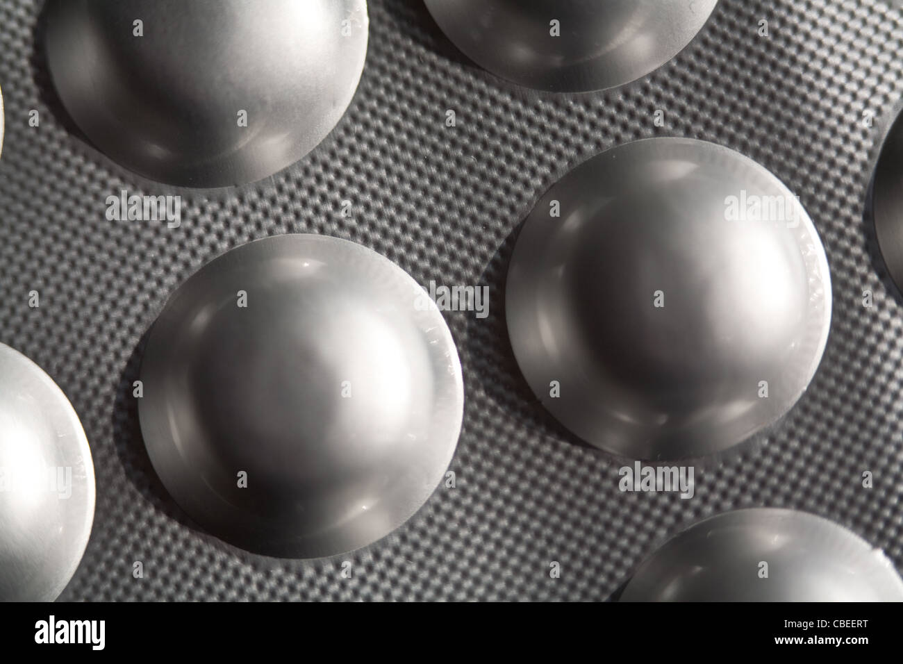 medicine in tablet form in sealed metallic strip blister packs Stock ...