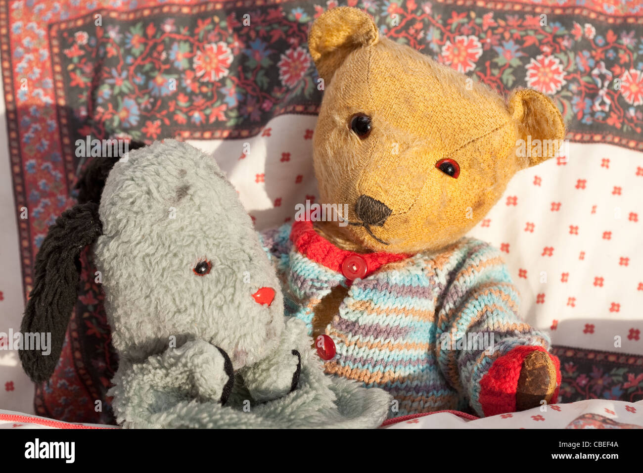 old toys, teddybear and puppet (Sweep) in bed Stock Photo - Alamy