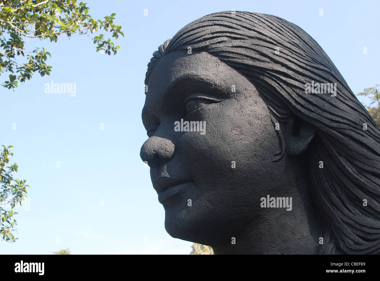 mother earth; a stone sculpture of a woman,kerala,india Stock Photo - Alamy