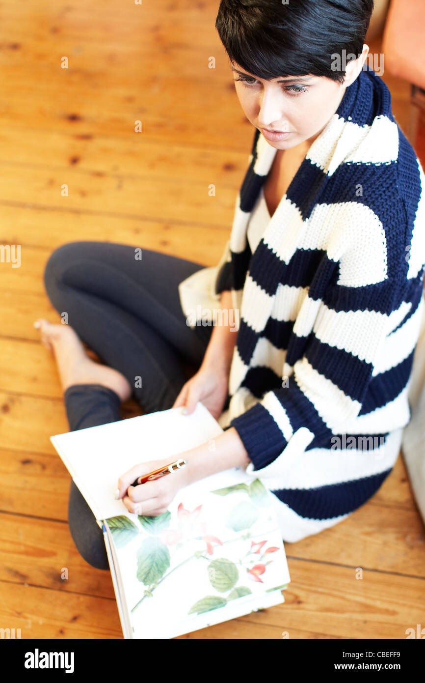 Girl writing in diary Stock Photo - Alamy Girl writing in diary Stock Photo - Alamy