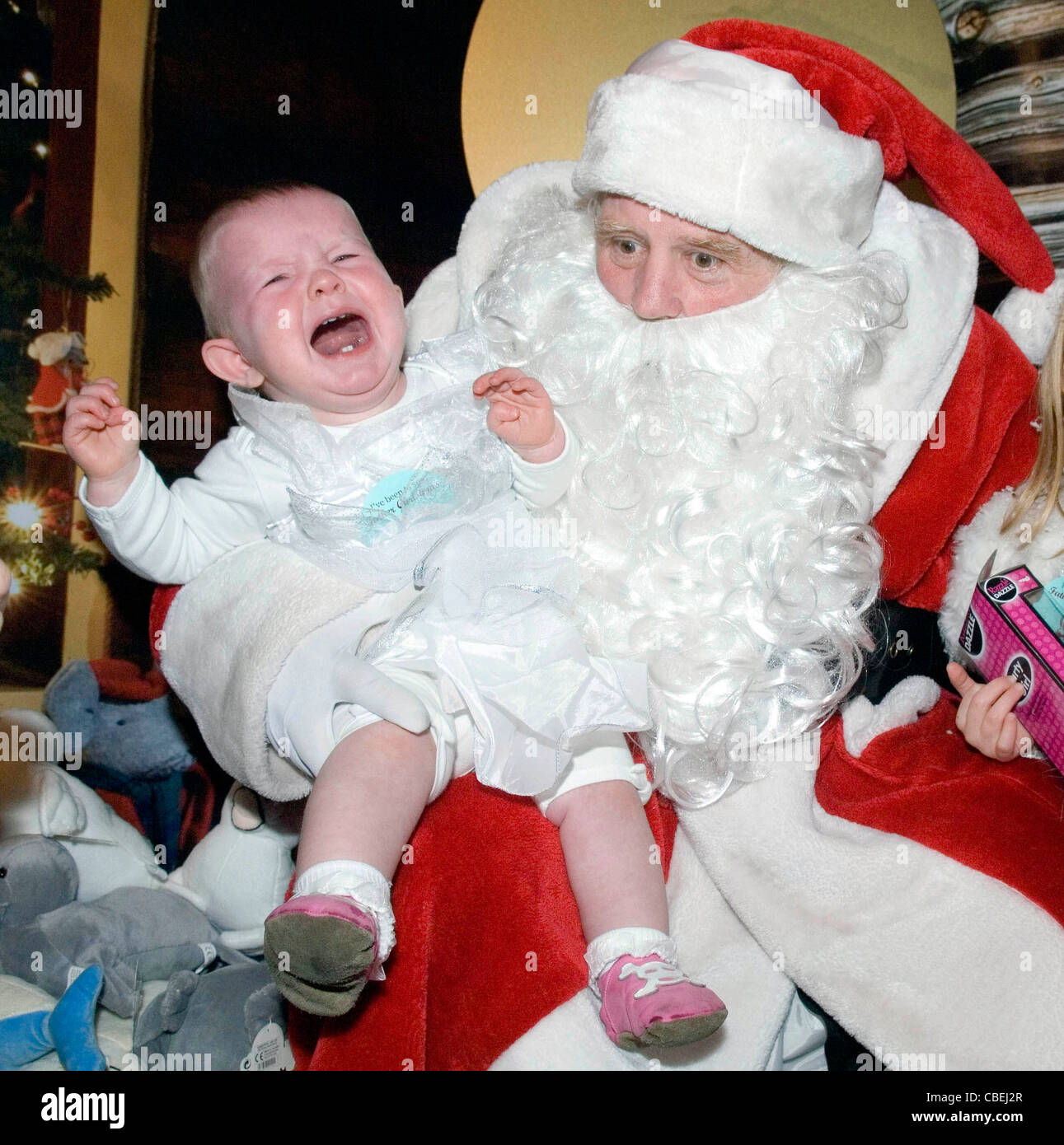 Child and father christmas frightened hi-res stock photography and ...
