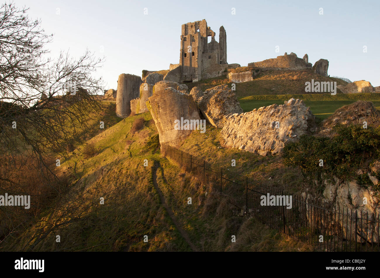 The great rugged ruins of Corfe Castle, with its broken down walls and ...