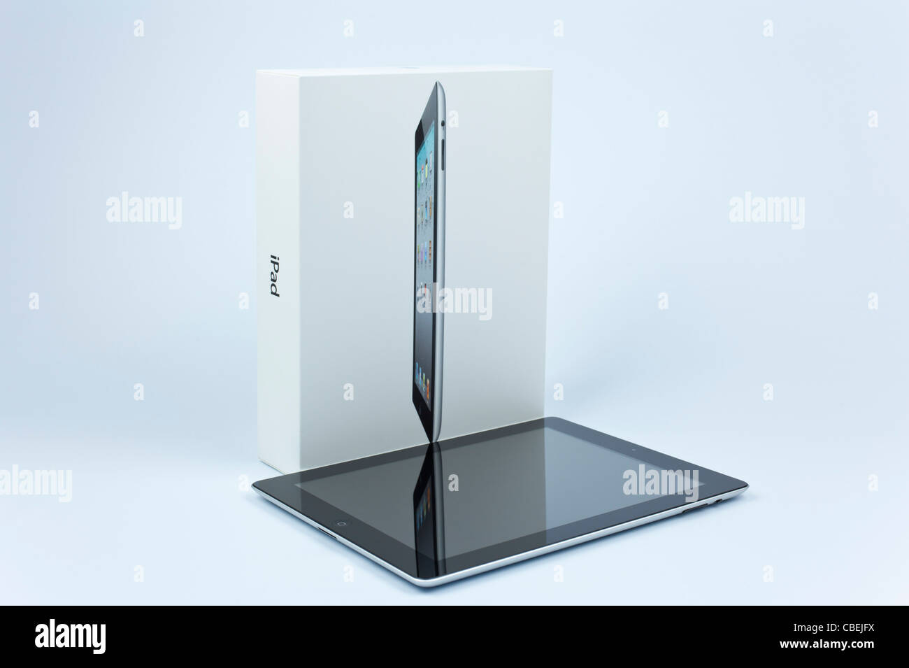 Ipad 2 tablet and box on white background Stock Photo - Alamy