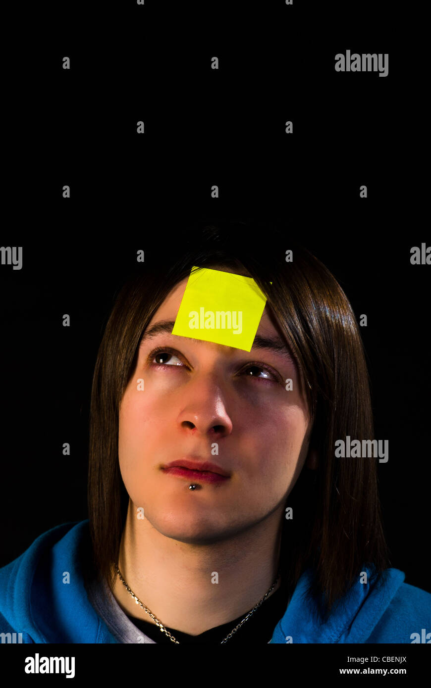 Forgetful guy with a sticky note on his forehead, a concept Stock Photo ...