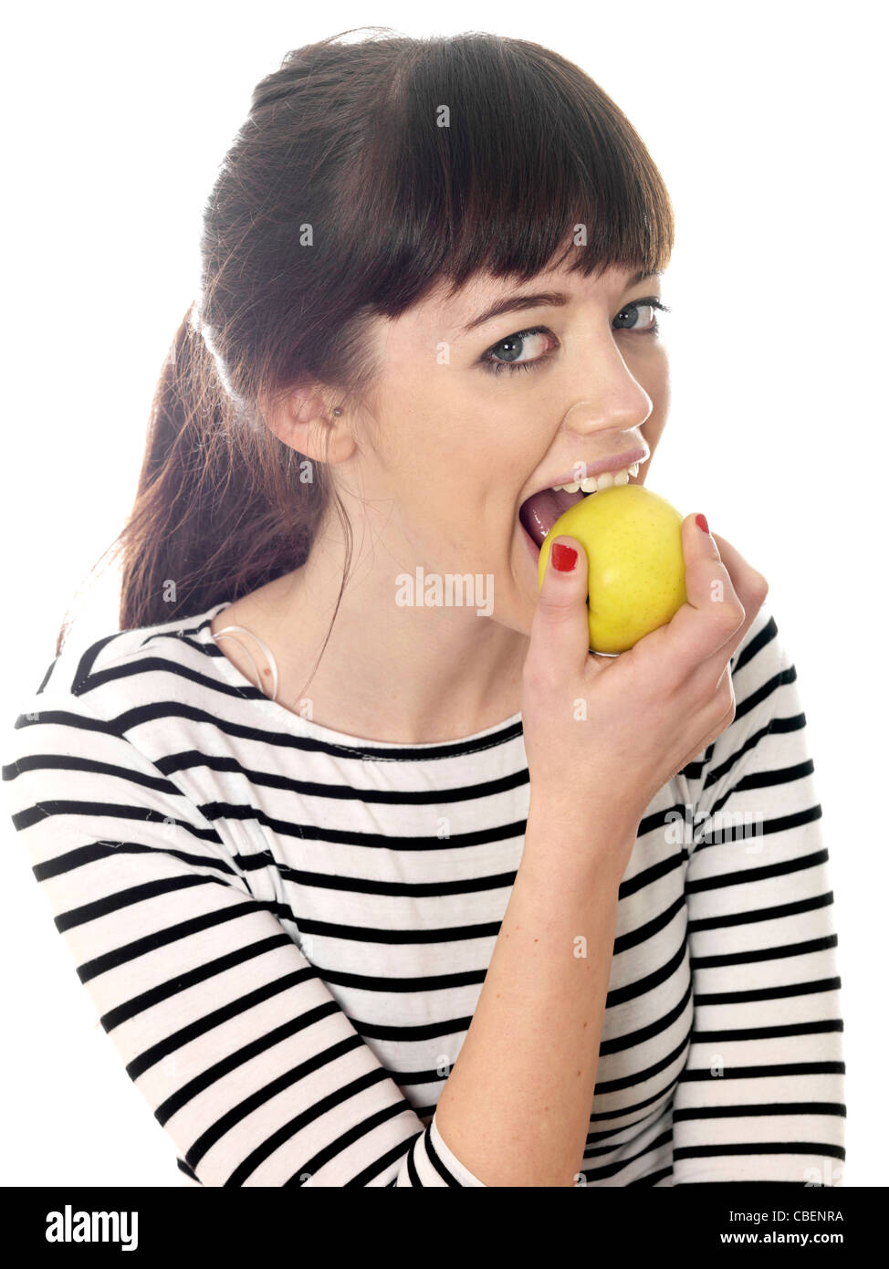 Young Woman Eating an Apple. Model Released Stock Photo - Alamy