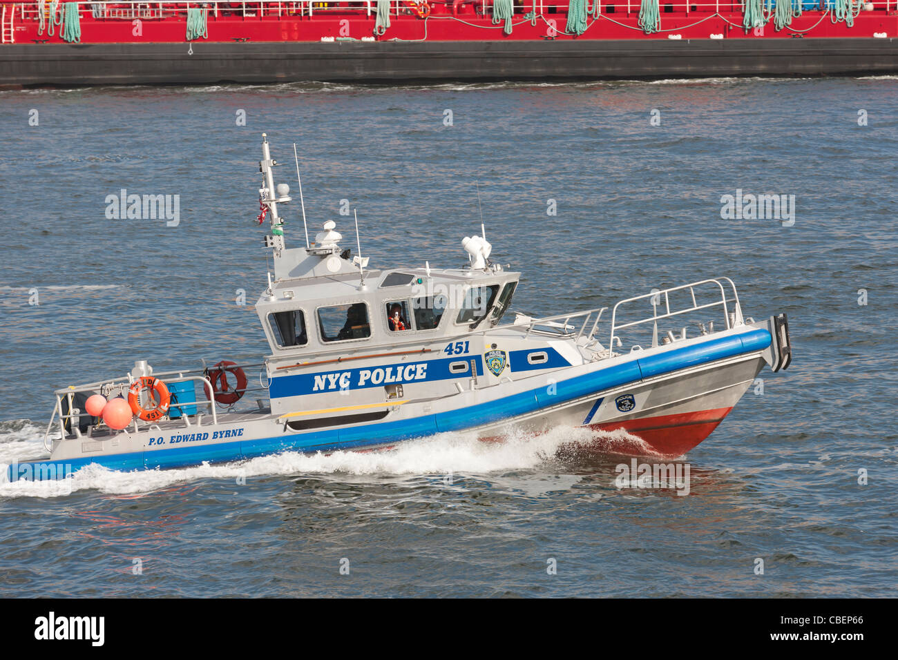 NYPD Harbor Patrol Boat P.O. Edward Byrne cruises on the East River in ...