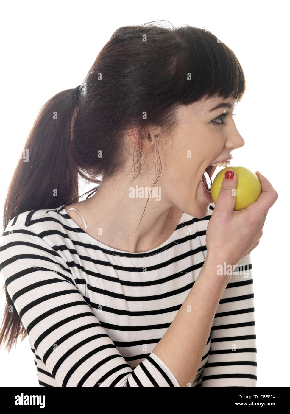 Young Woman Eating an Apple. Model Released Stock Photo - Alamy