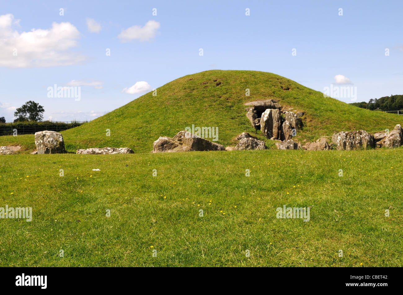 Entrance and part restores mound of Bryn Celli Ddy henge monument and ...