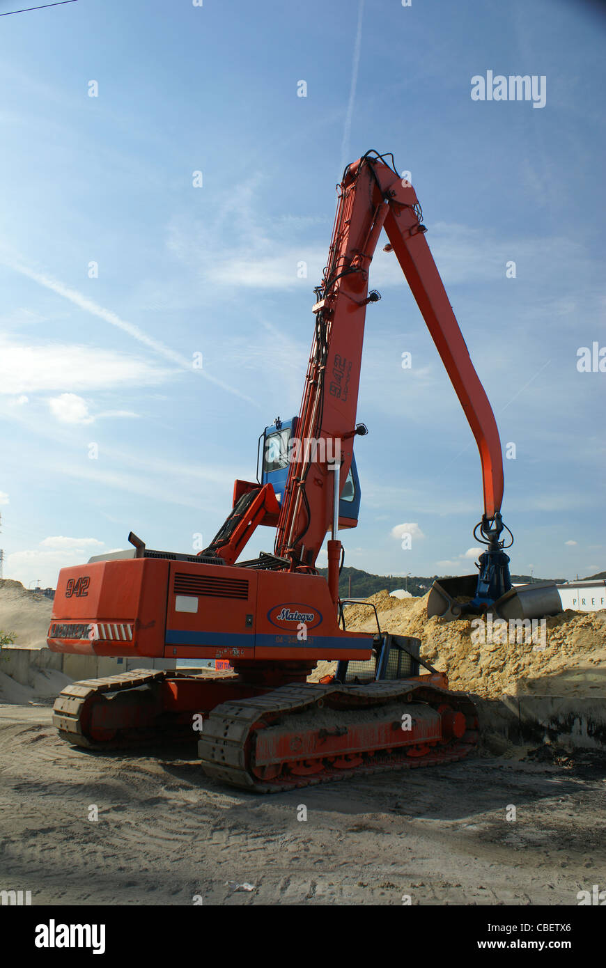 Red excavator hi-res stock photography and images - Alamy