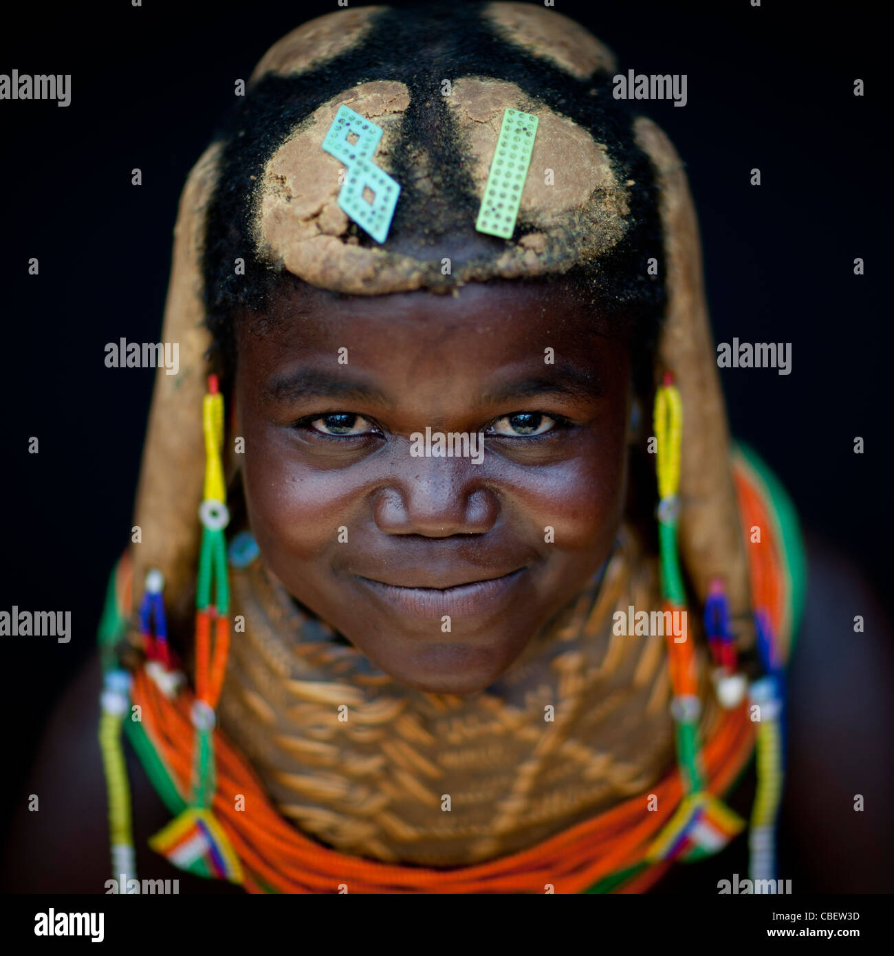 Mwila Girl With The Traditional Vikeka Mud Necklace, Angola Stock Photo ...