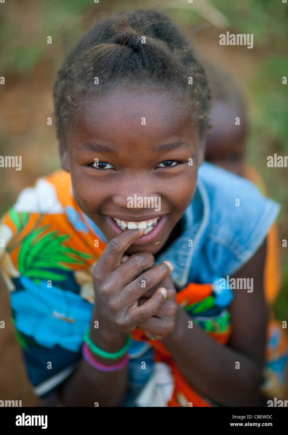 Girl Smiling At The Camera, Village Of Caconda, Angola Stock Photo - Alamy