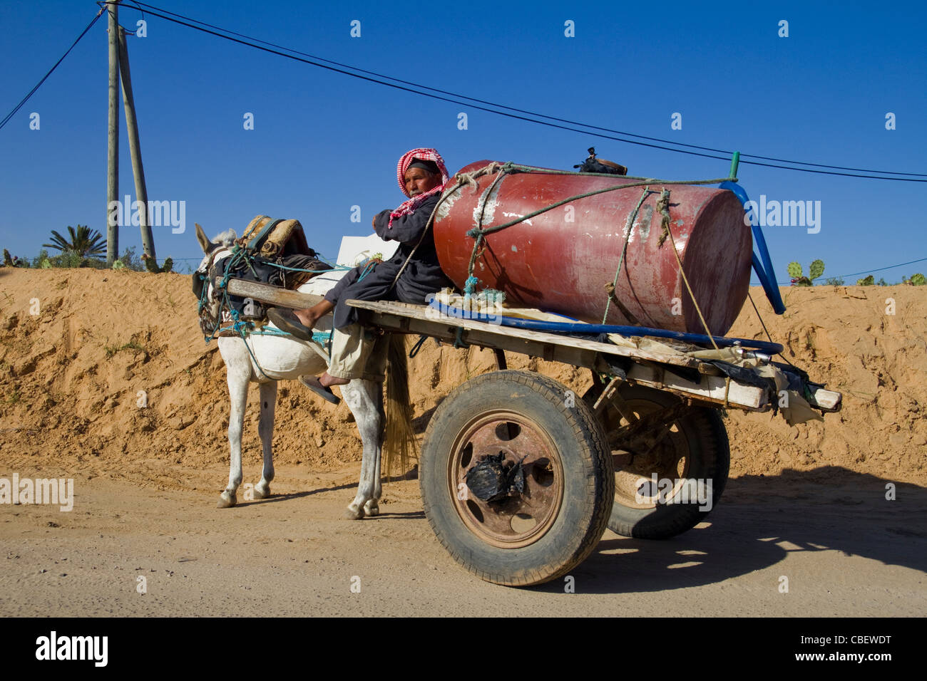 Water carrier in Djerba, Tunisia, North Africa Stock Photo - Alamy