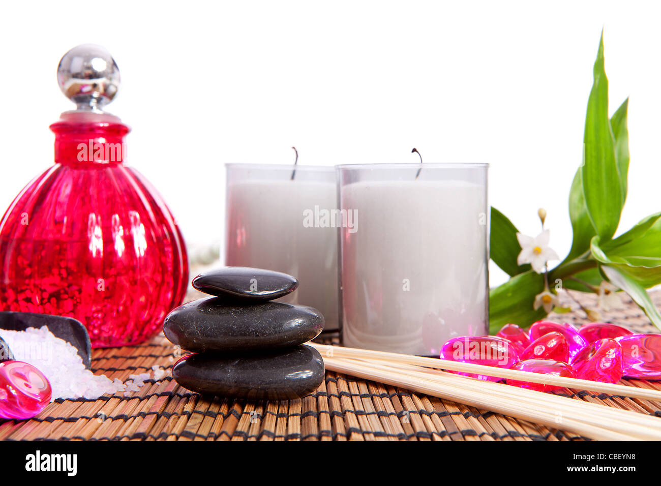 pink spa zen accessories and bamboo on cane mat Stock Photo - Alamy