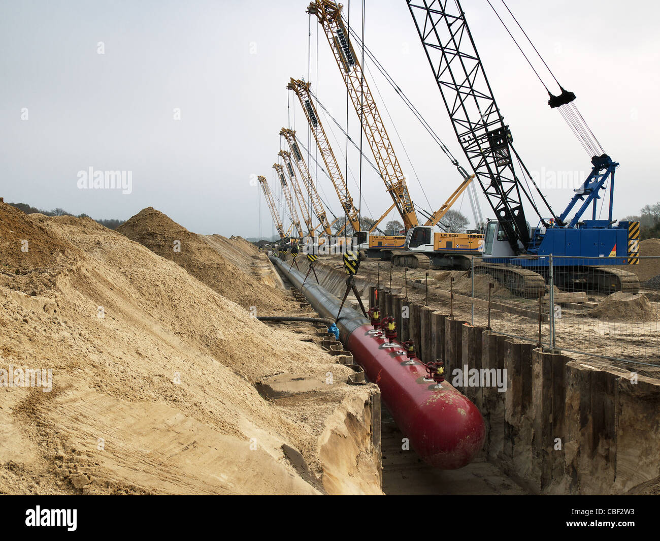 Crane lifting pipes High Resolution Stock Photography and Images - Alamy