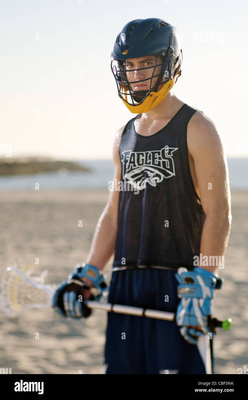 A portrait of a lacrosse athlete on the beach Stock Photo - Alamy