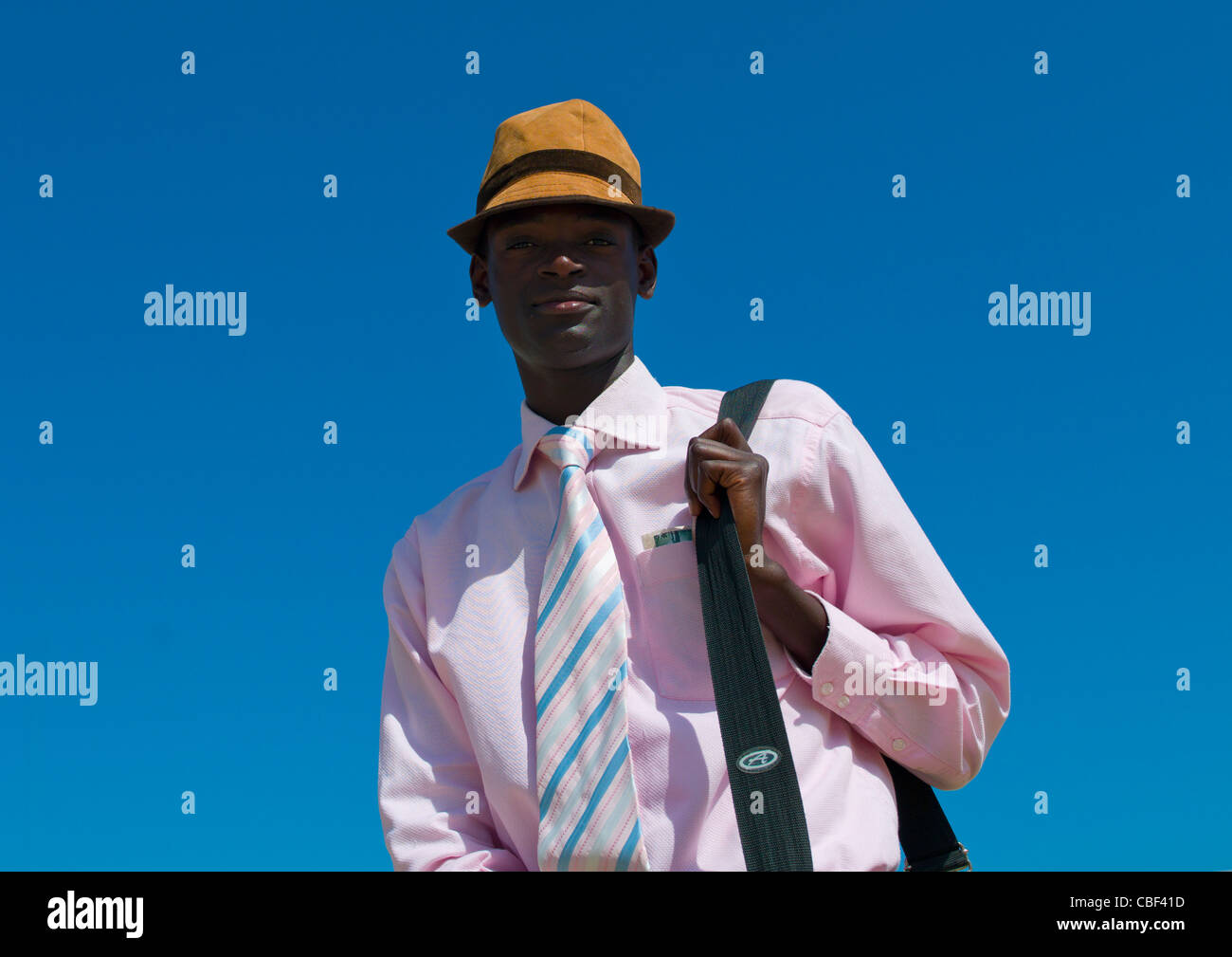 Elegant Man With A Hat And A Pink Shirt, Namibe Town, Angola Stock ...