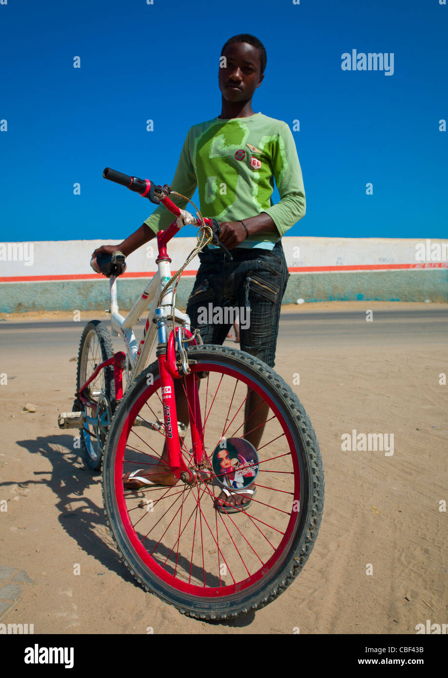 Young Man With His Bike, Namibe Town, Angola Stock Photo - Alamy
