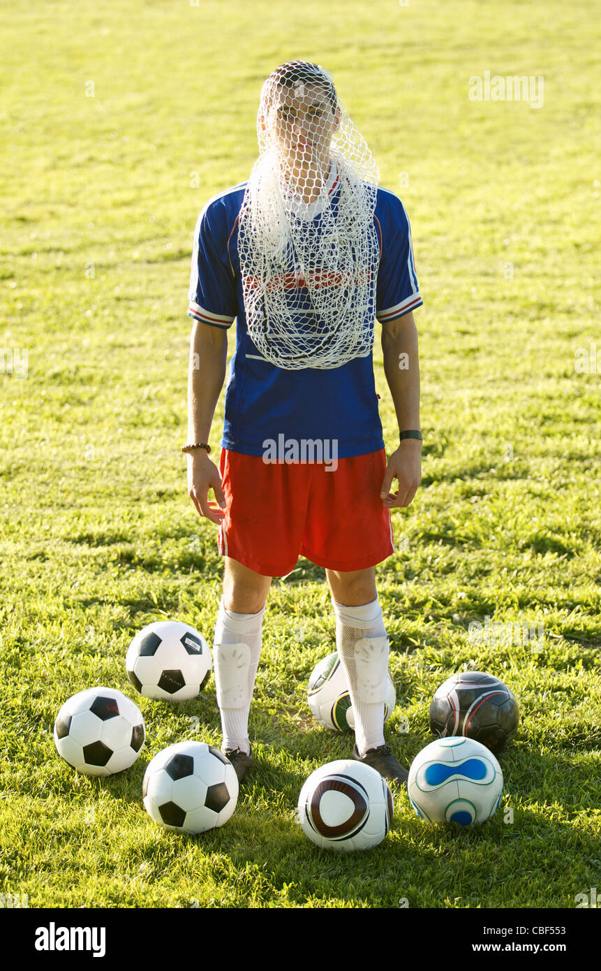 Portrait of a male soccer football player Stock Photo - Alamy