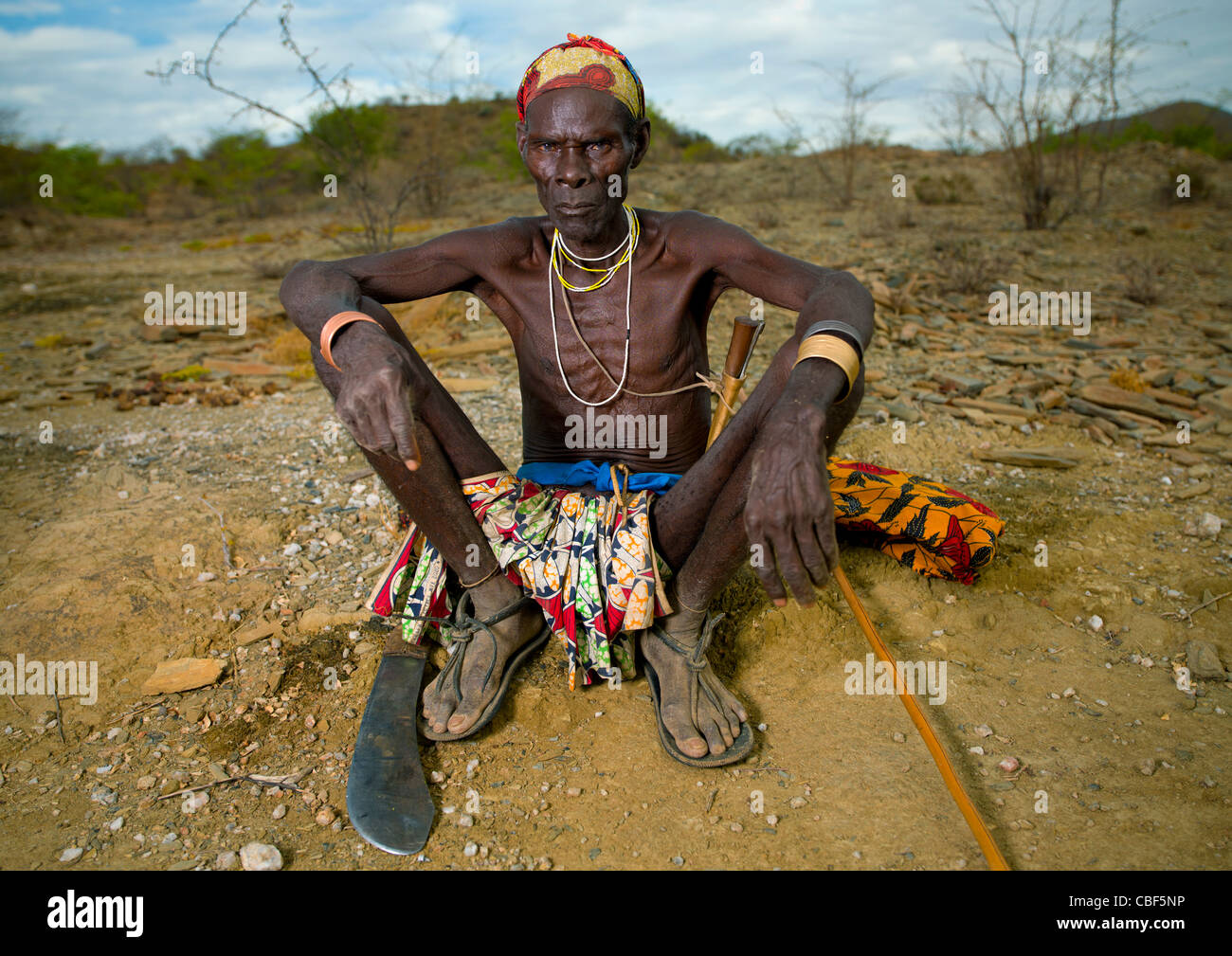 Old Mucubal Man Sitting, Virie Area, Angola Stock Photo - Alamy