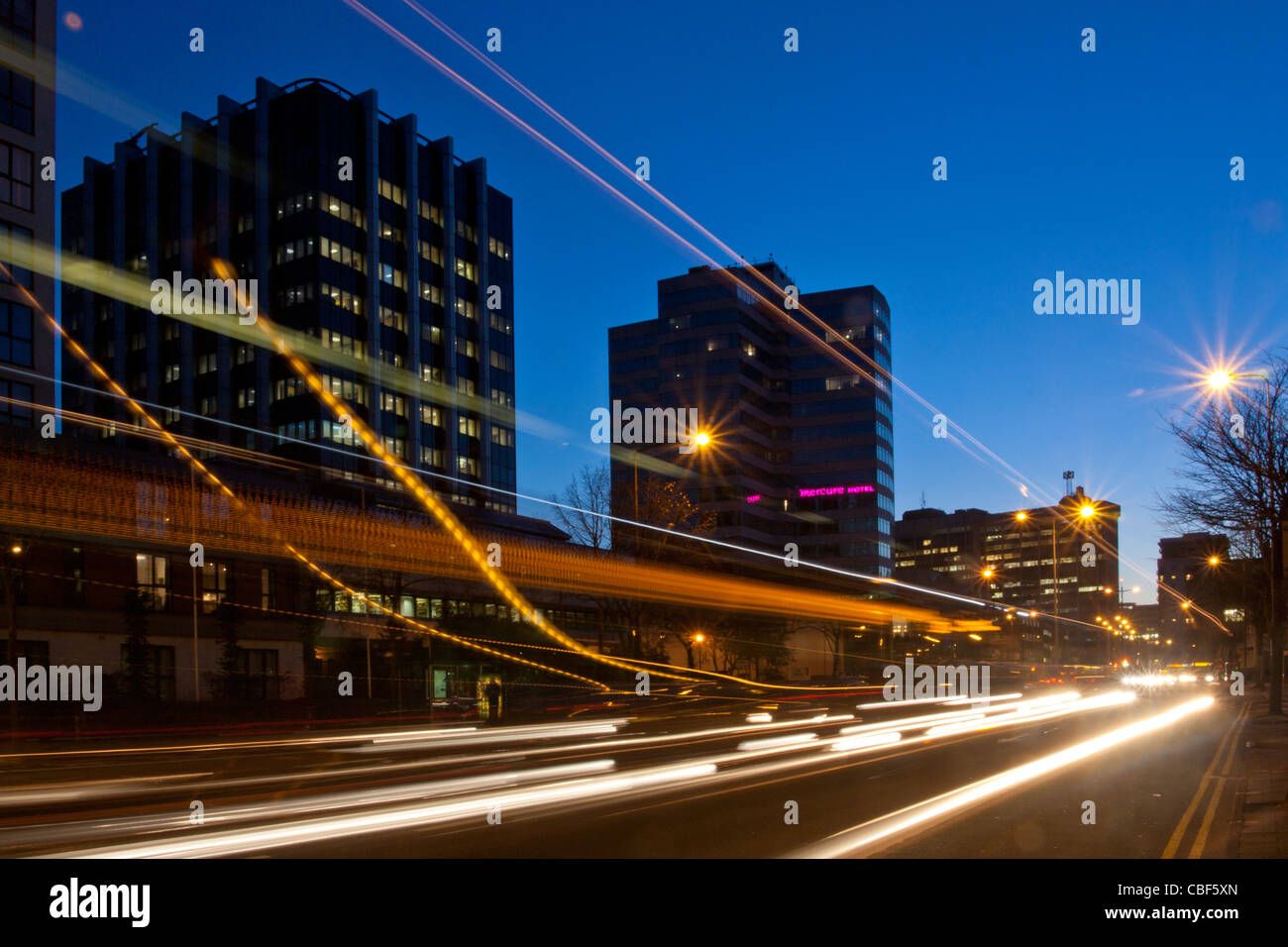 Newport Road Cardiff at twilight / night with office buildings and ...