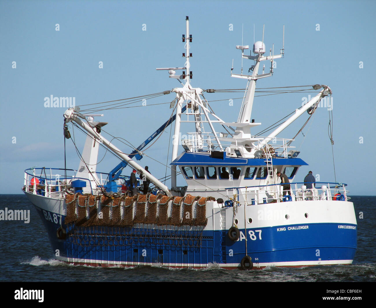 CLAM FISHING BOAT Stock Photo - Alamy