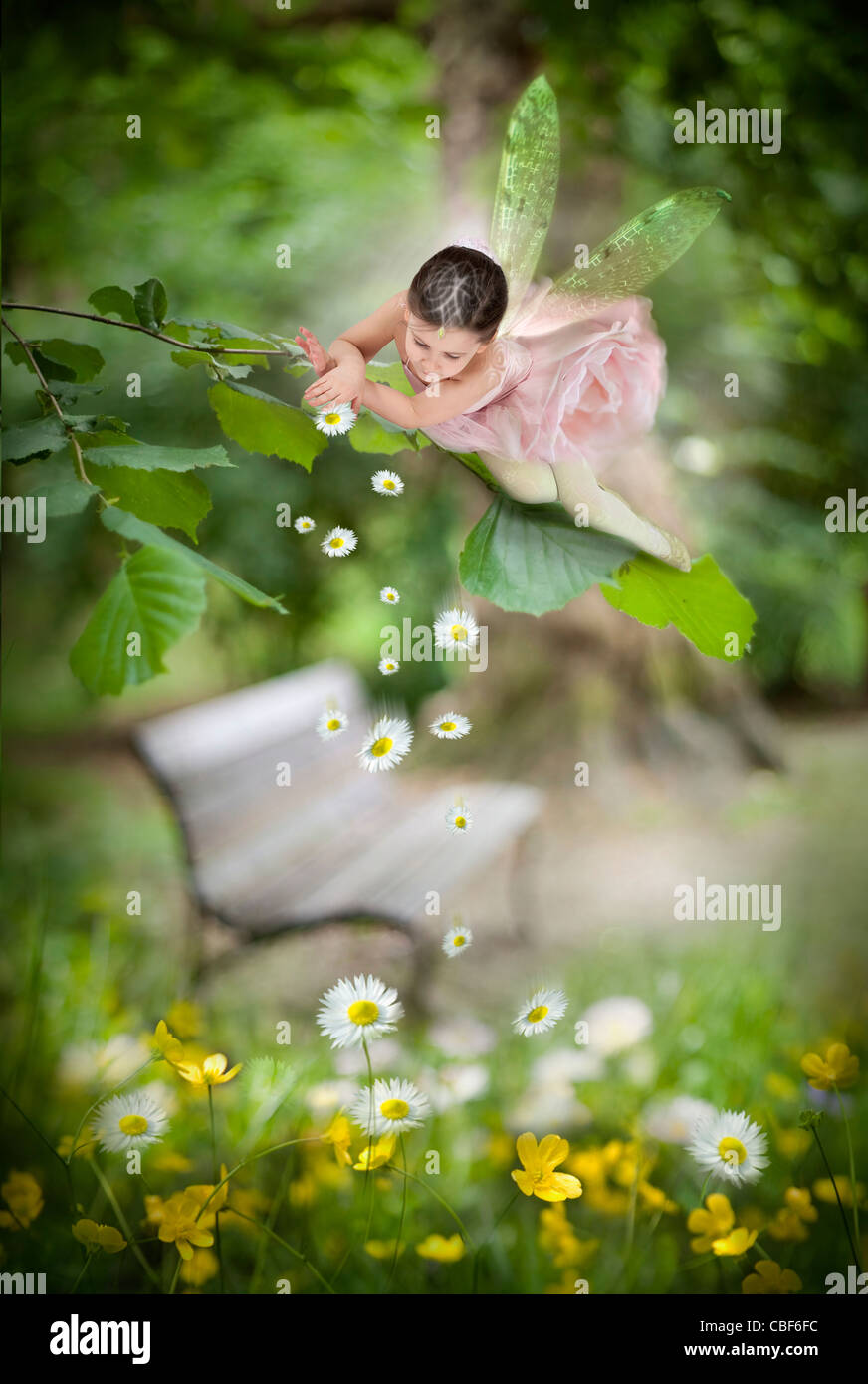 Sweet little fairy on the branch Stock Photo - Alamy