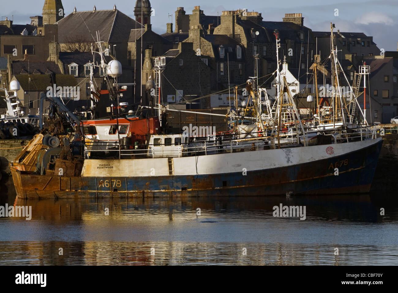 FISHING BOAT IN HARBOUR Stock Photo - Alamy
