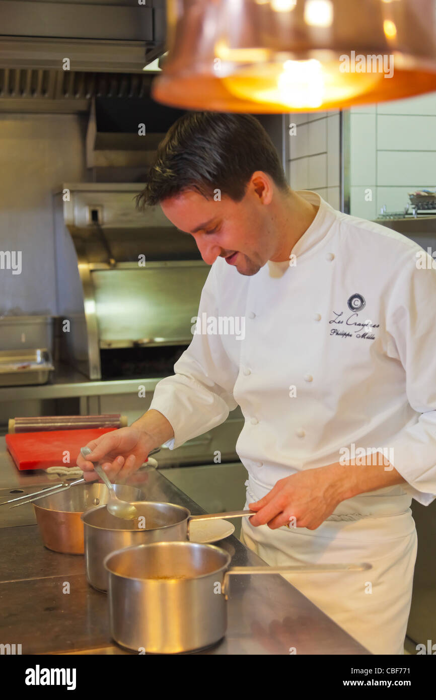 Philippe Mille is preparing a stock for a recipe., Member of the ...