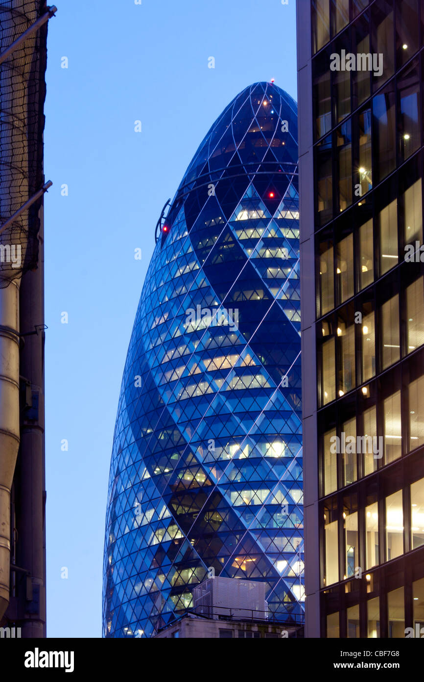 Swiss Re Building 30 St Mary Axe also known as the Gherkin View at dawn ...