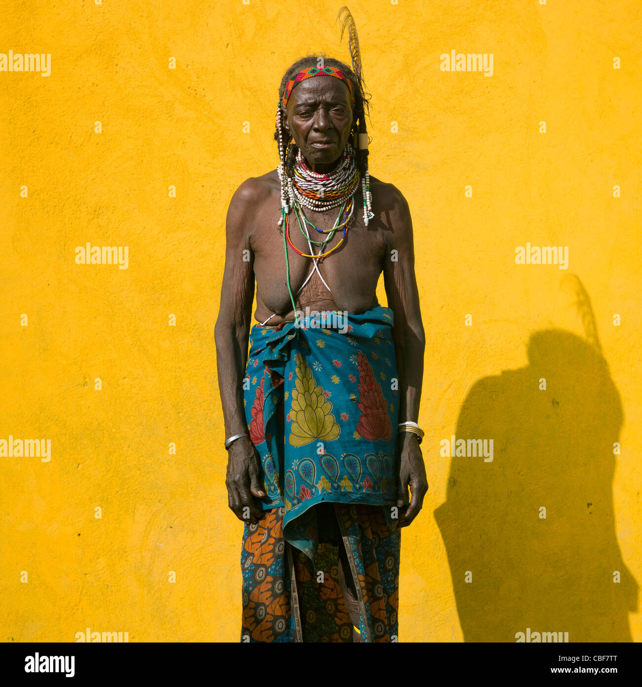 Old Mwila Woman Wearing A Feather, Huila Town Market, Angola Stock ...
