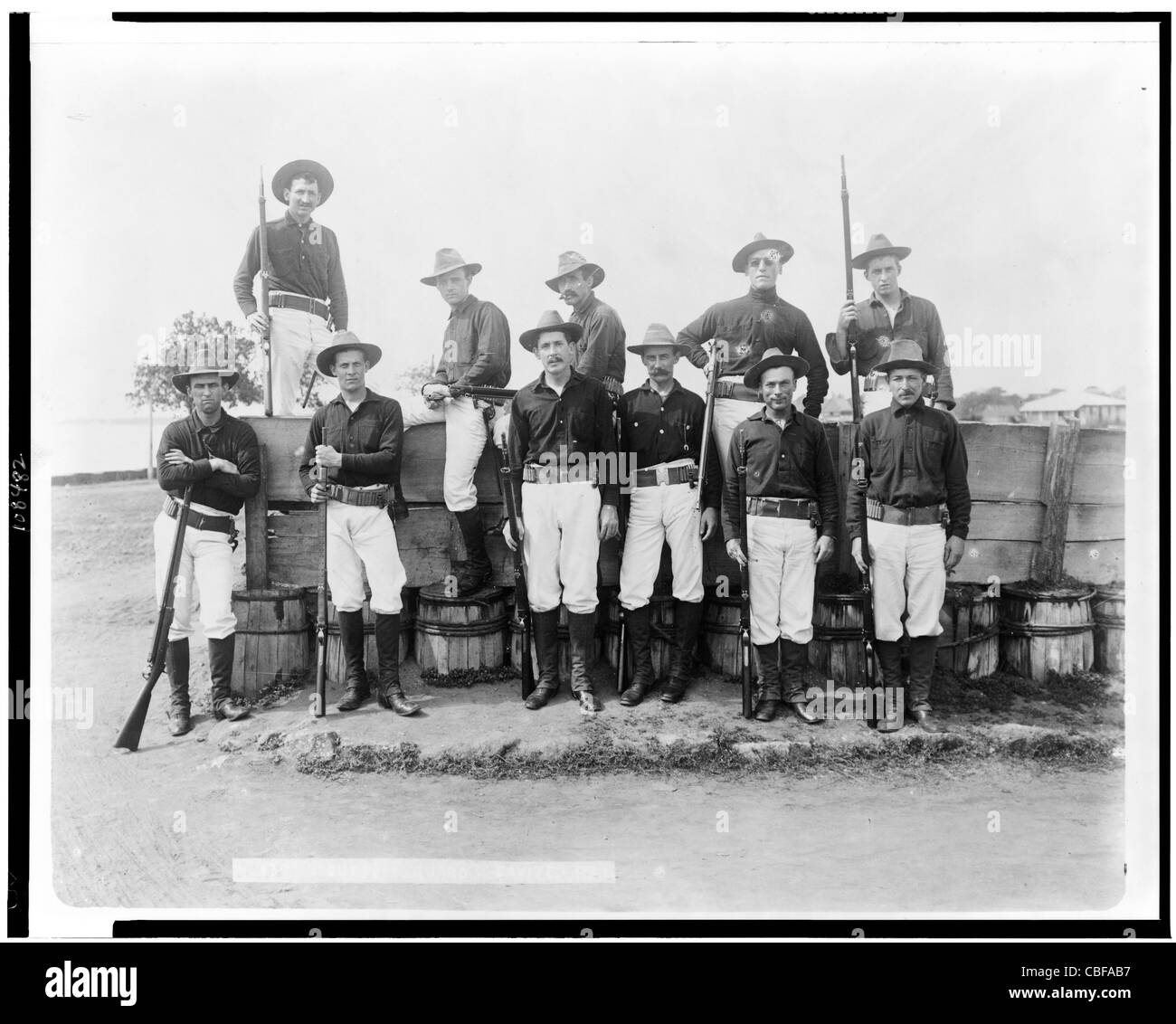 Eleven American soldiers(?) posed, Cavite, Philippine Islands. 1899 ...