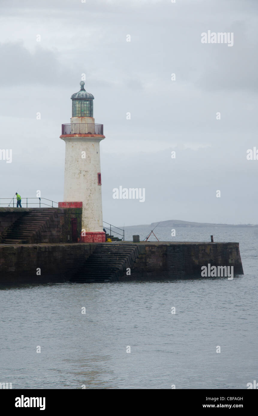 The lighthouse on the West pier of Whitehaven, Cumbria, England, UK ...