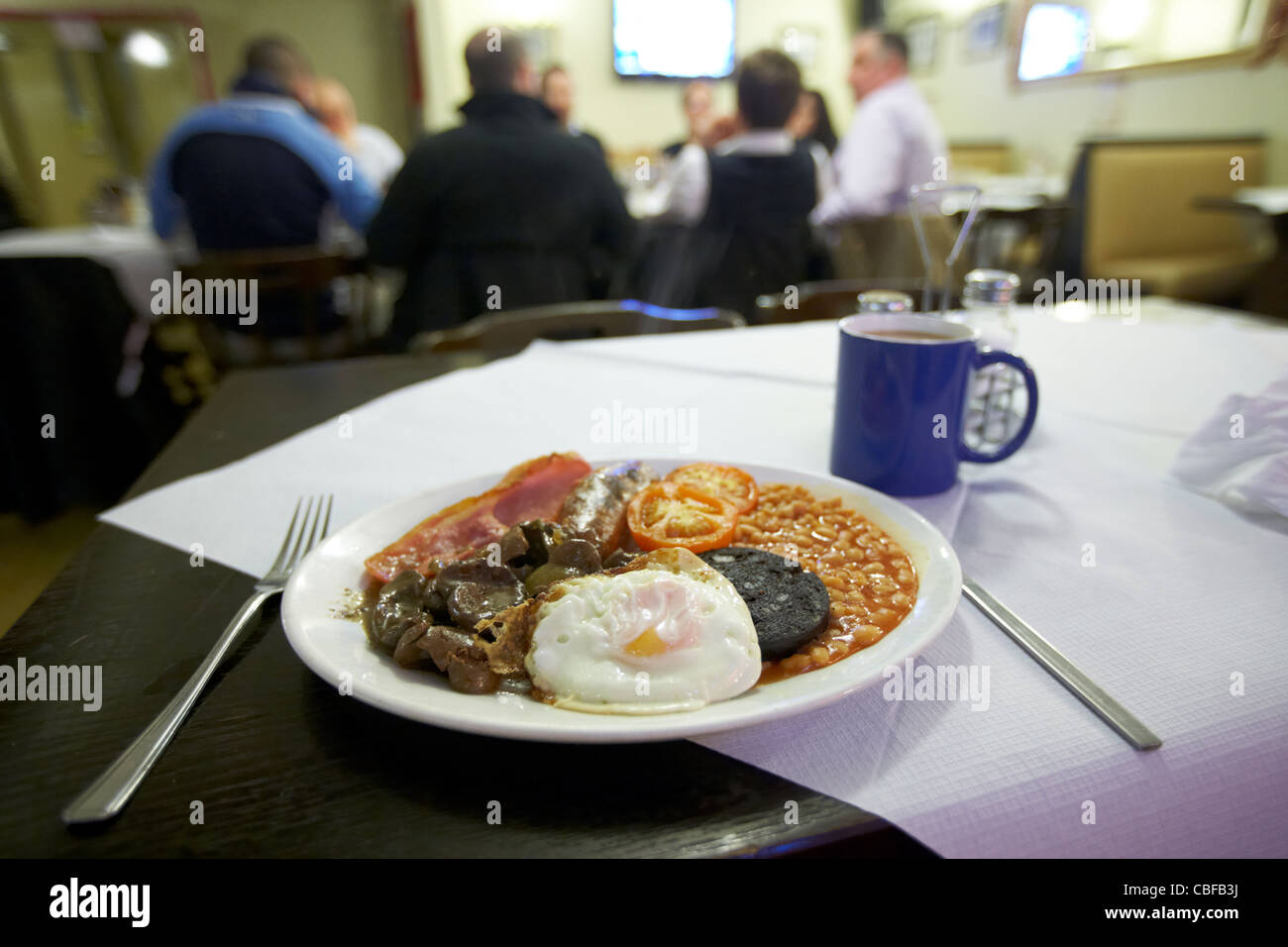full english fried breakfast and mug of tea in a pub in london england ...