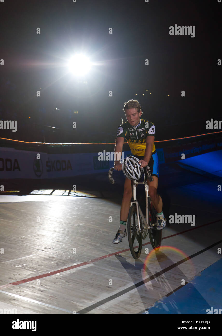 Professional athletes competing in motorbike driven stayer race at ...