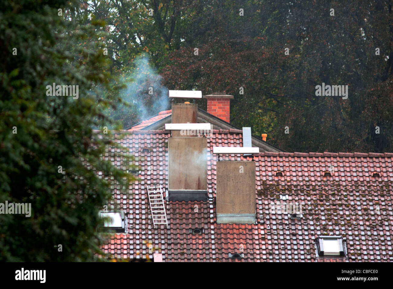 House Chimney Smoke Stock Photos & House Chimney Smoke Stock Images - Alamy