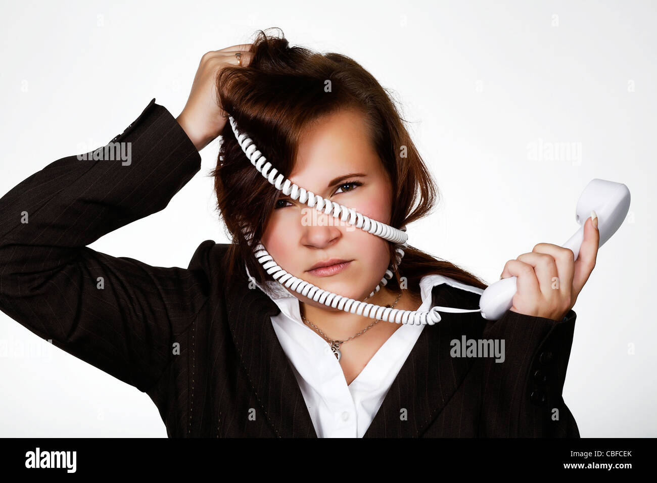 portairt of woman with telephone cord wrapped around face Stock Photo ...