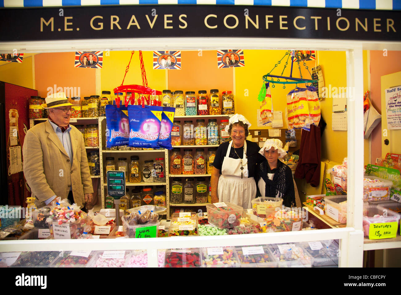 Louth Victorian Market, Lincolnshire, England, sweet shop workers ...
