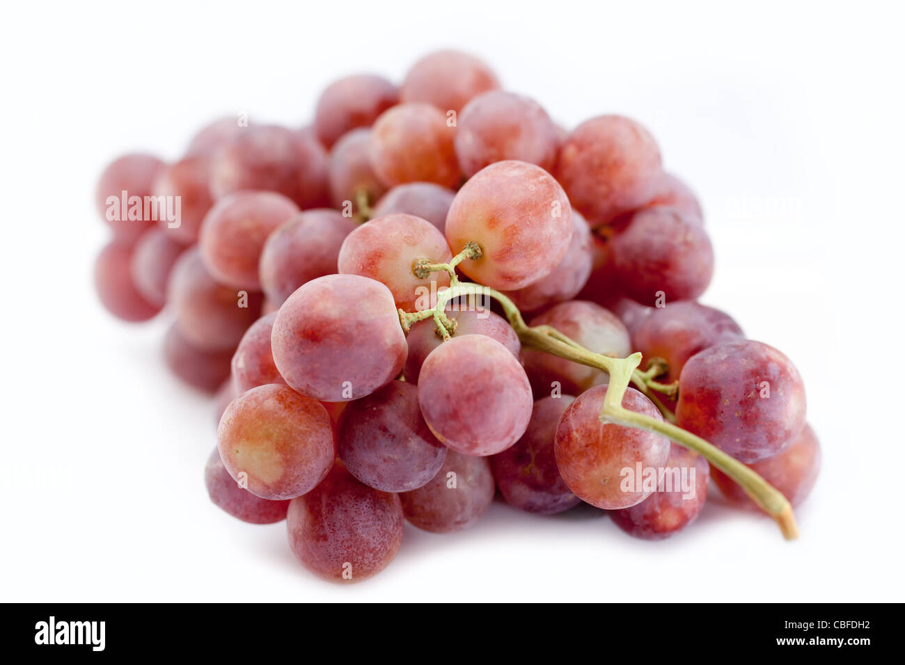 Red grapes isolated on white with shadow Stock Photo - Alamy