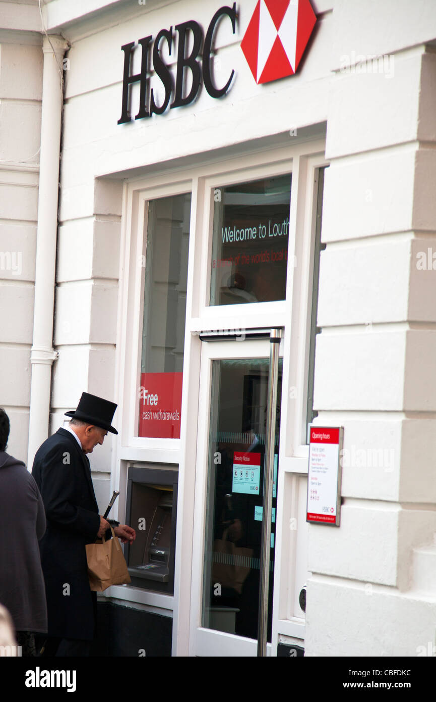 Louth Victorian Market, Lincolnshire, England man in top hat using ...
