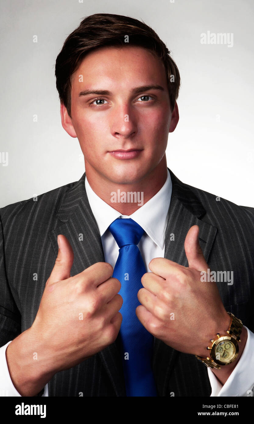 business man with his thumbs up saying good job Stock Photo - Alamy
