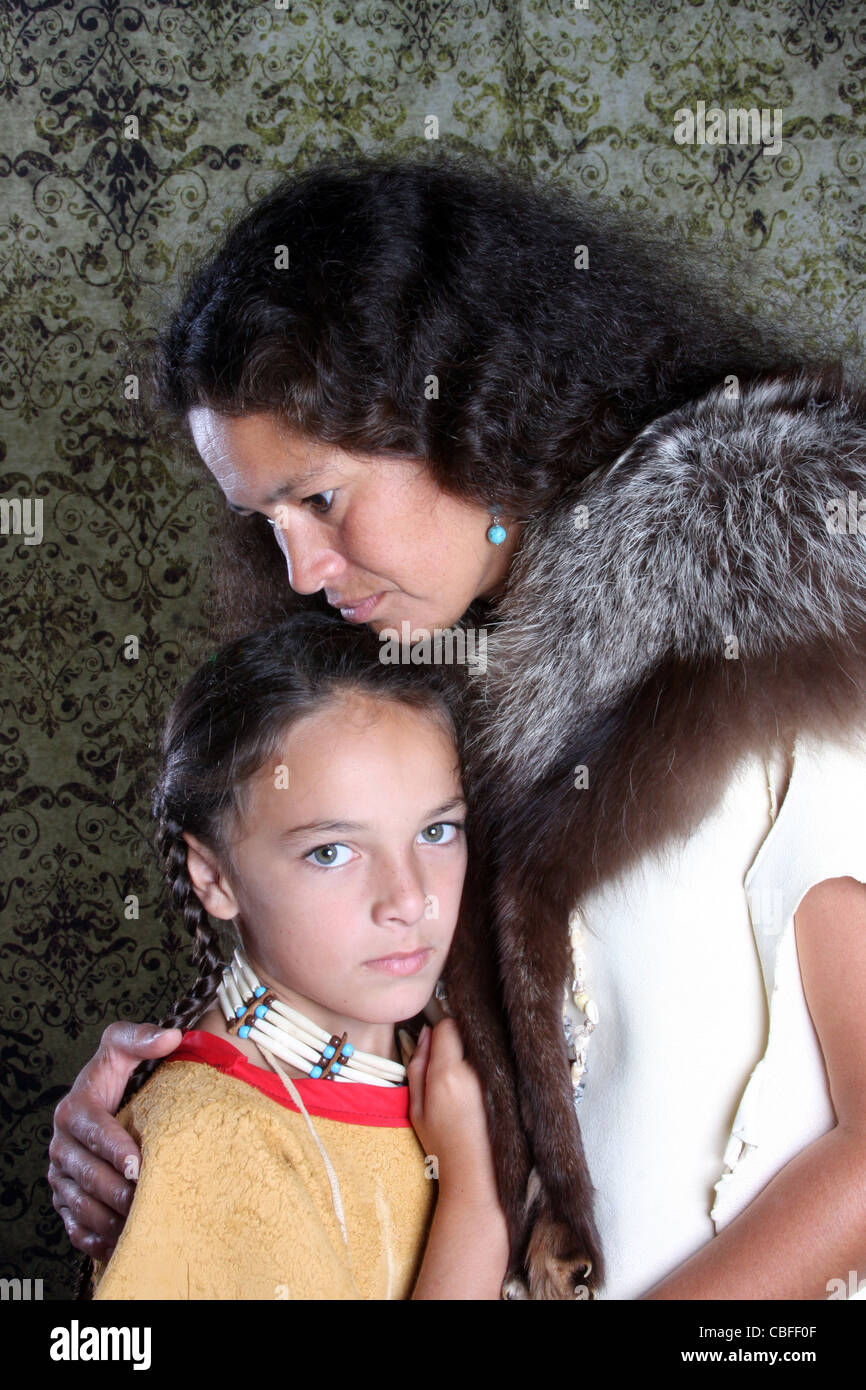 Native American Lakota Sioux Indian woman hugging a male child Stock ...