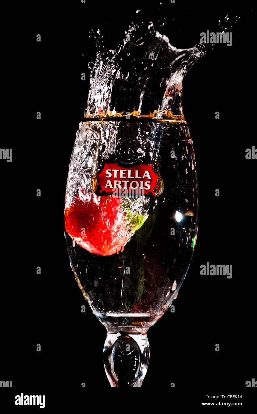 Fresh strawberry dropped glass hi-res stock photography and images - Alamy