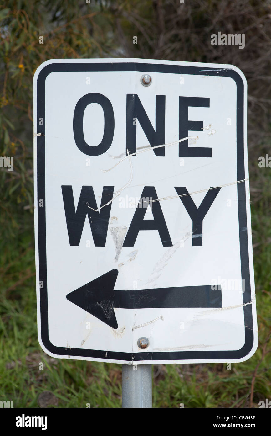 A black and white 'one way' road sign Stock Photo - Alamy