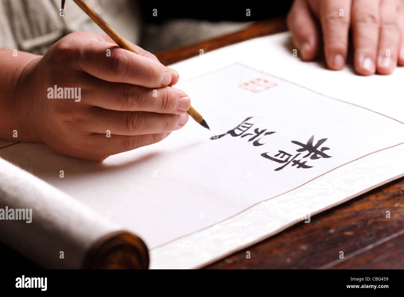 Man writing calligraphy Stock Photo - Alamy