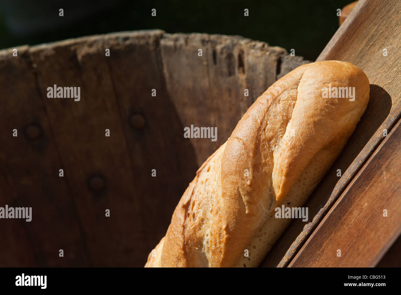 French stick in wooden barrel Stock Photo - Alamy
