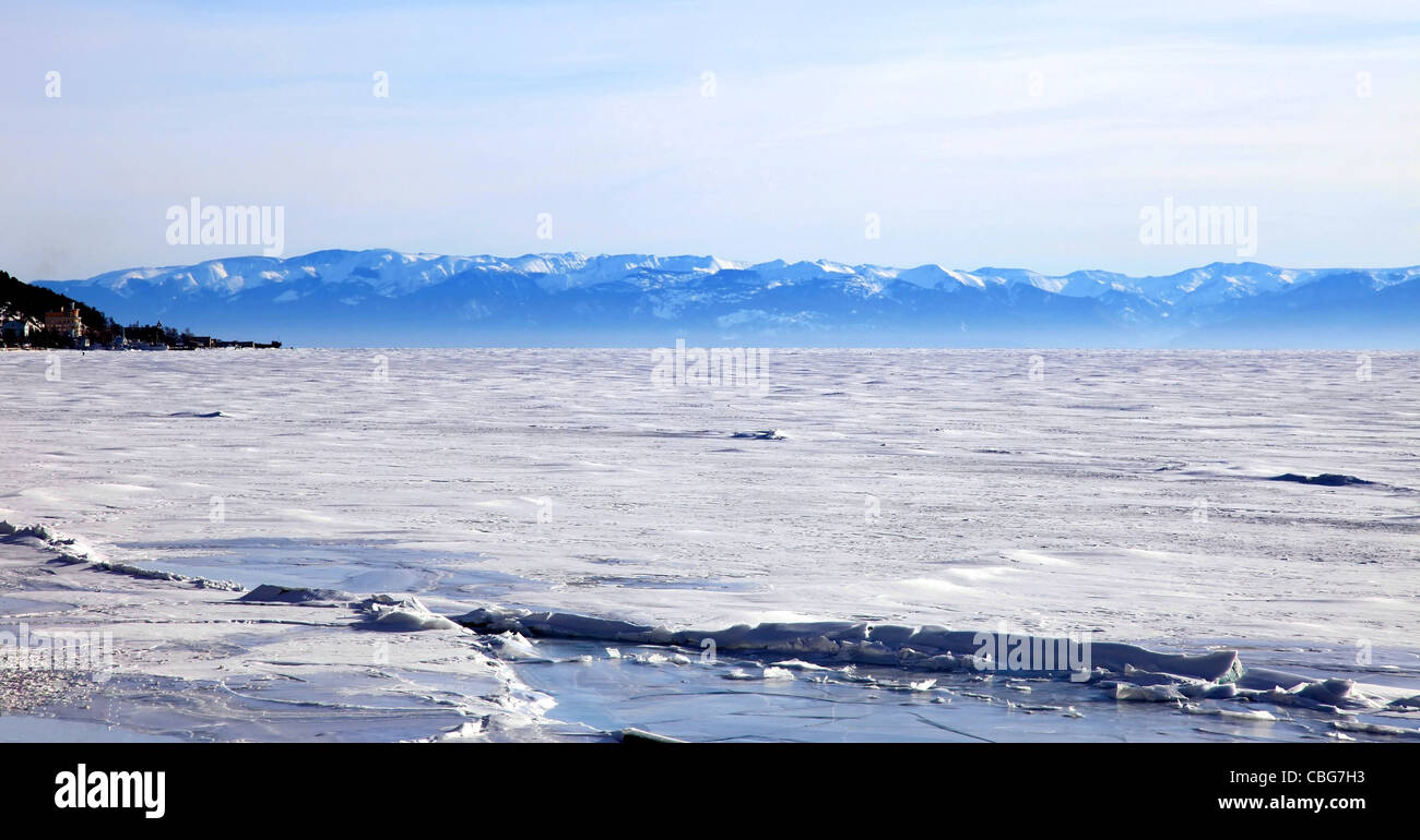 Frozen Lake Baikal, winter, twilight. Moody sky Stock Photo - Alamy