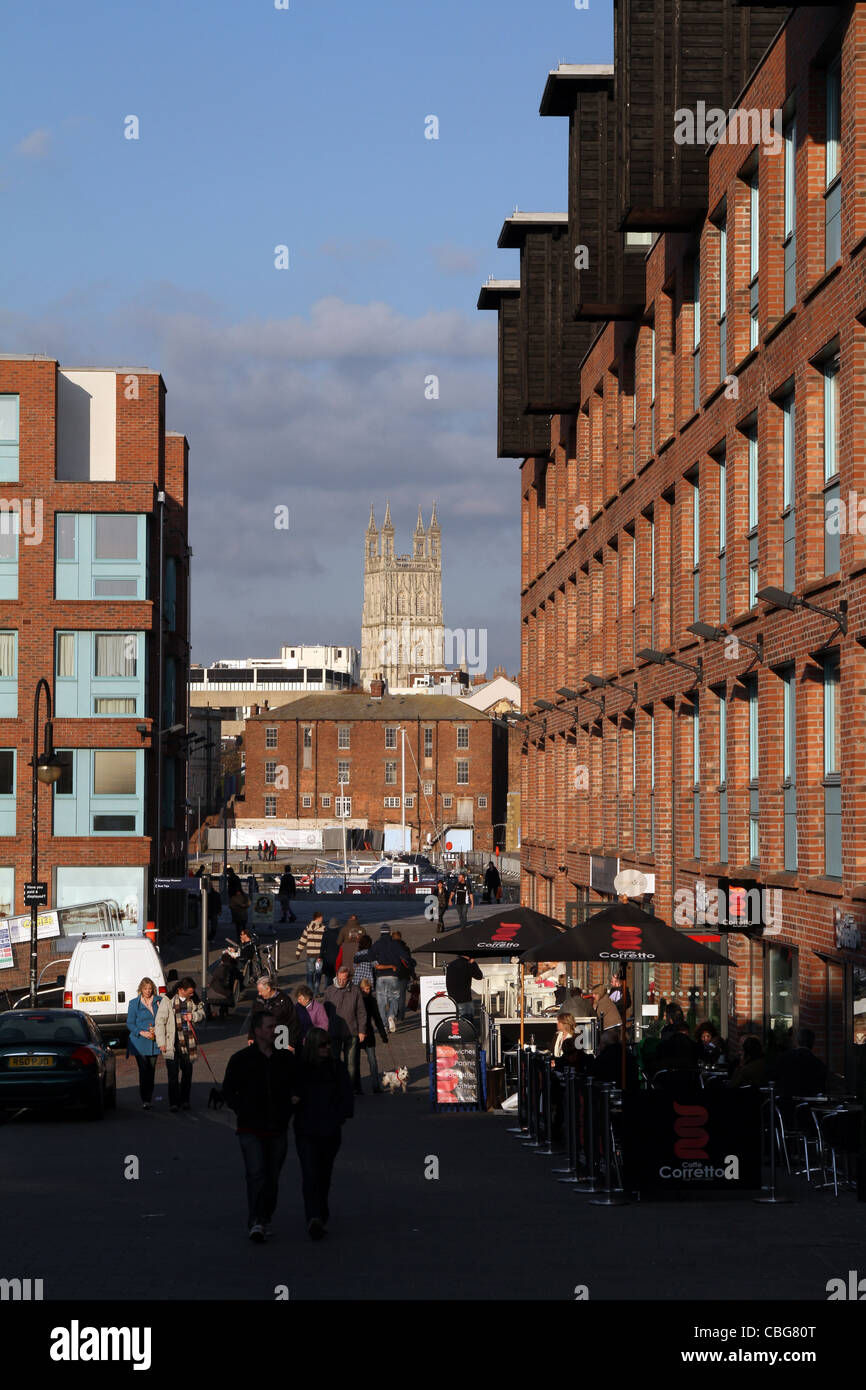 Gloucester Quays outdoor shopping leading to Gloucester cathedral tower ...